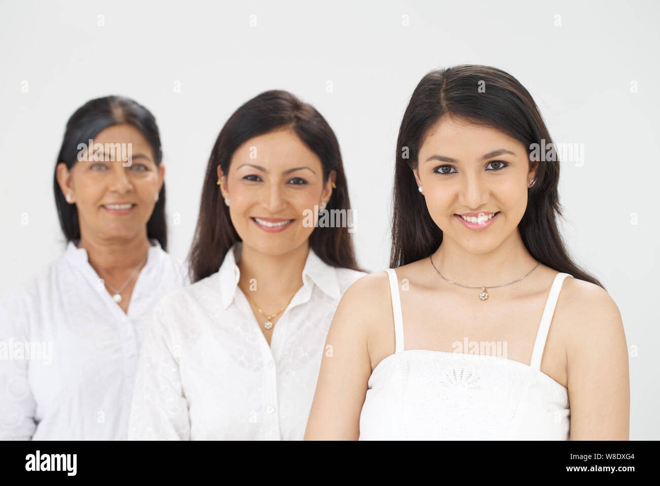 Three generation of women in a row Stock Photo - Alamy