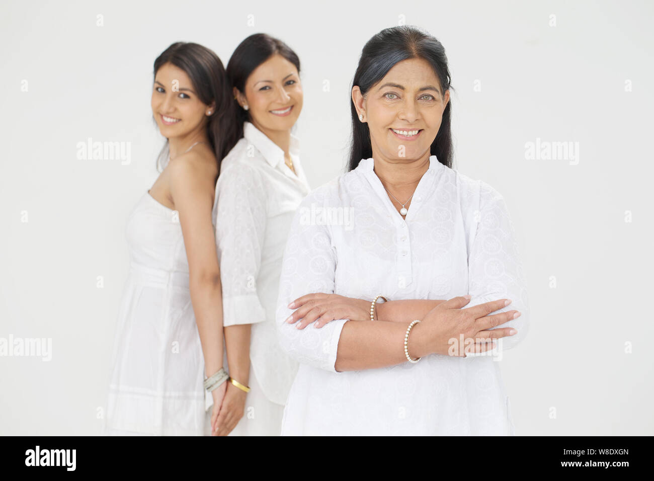 Back view three generation family hi-res stock photography and images ...