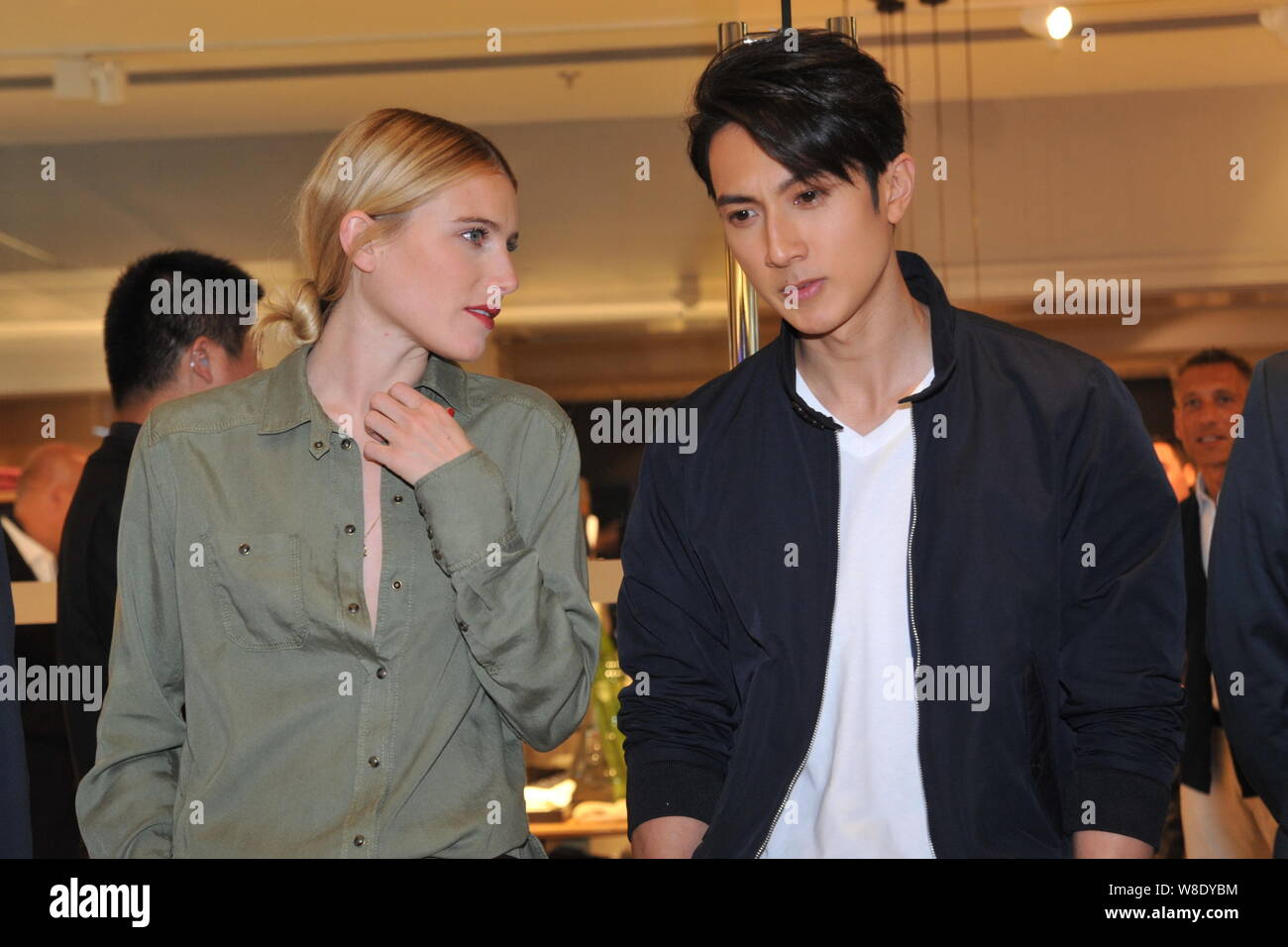 American model and actress Dree Hemingway, left, talks with Bruneian ...