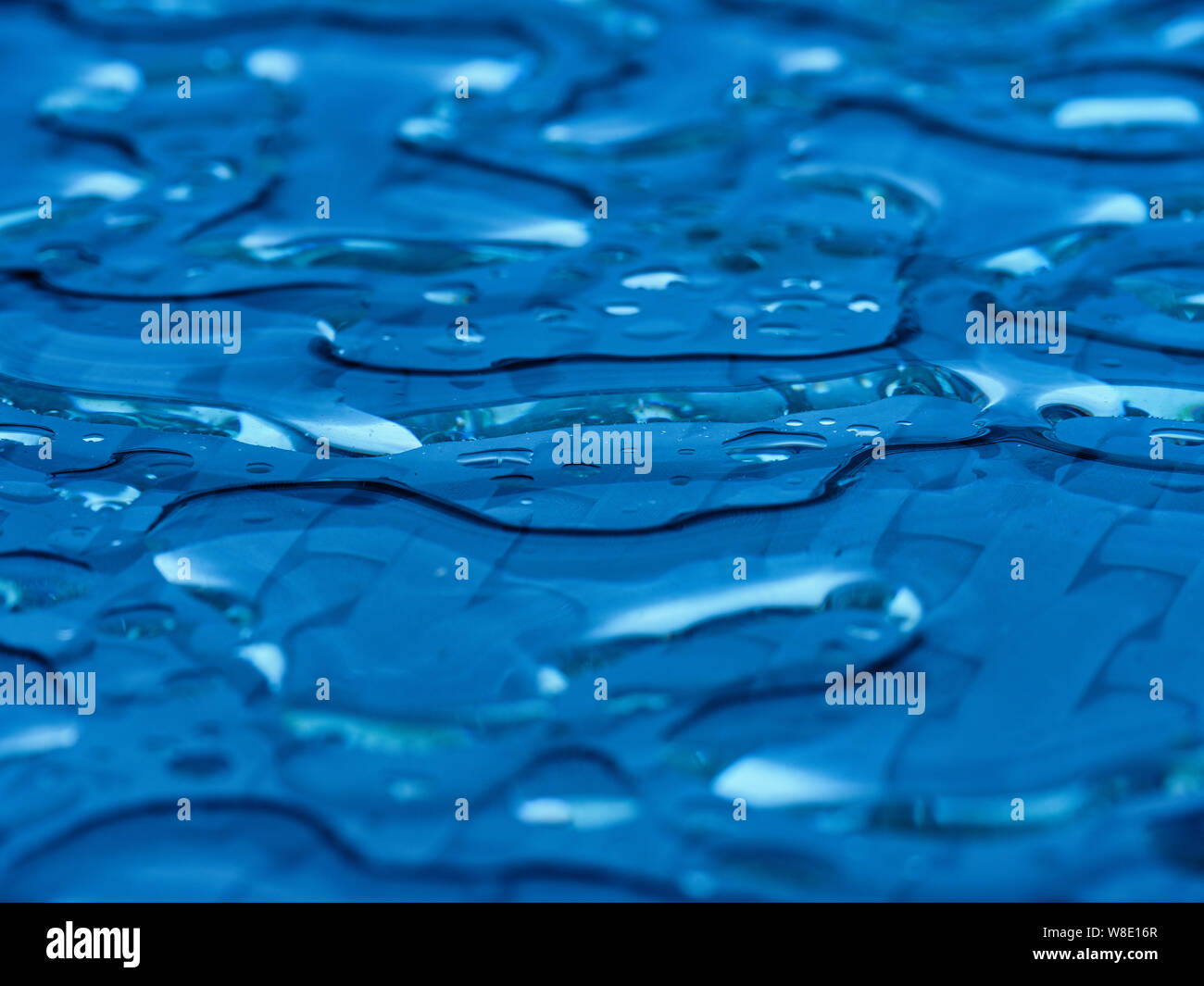 The soothing shape of blue water Stock Photo - Alamy