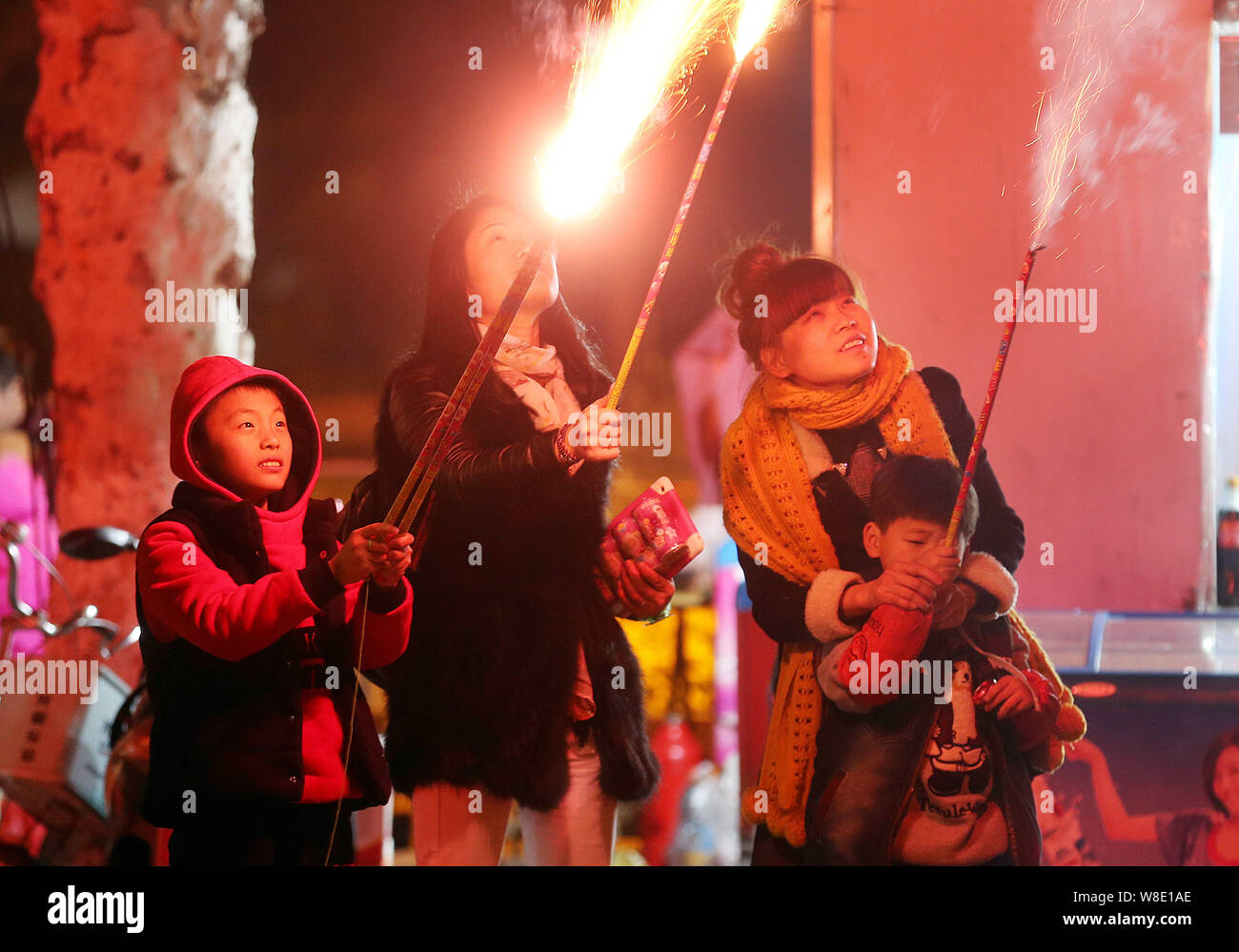 Local residents set off fireworks at a residential area for Spring ...