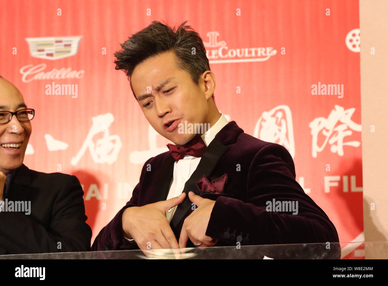 Chinese actor Deng Chao poses at a press conference for his movie "The ...