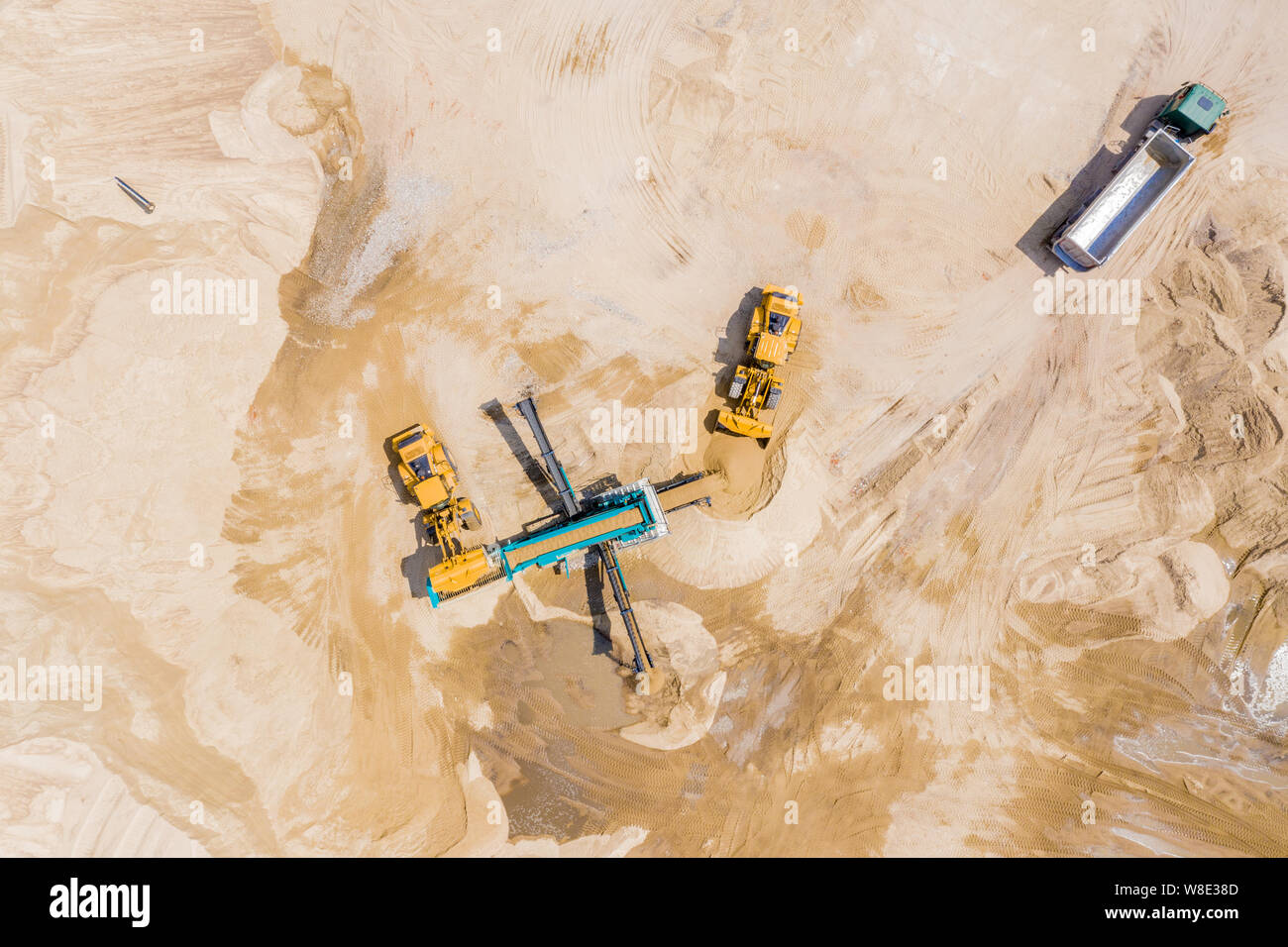 Aerial view of sand mining operation extracting a range of mineral ...