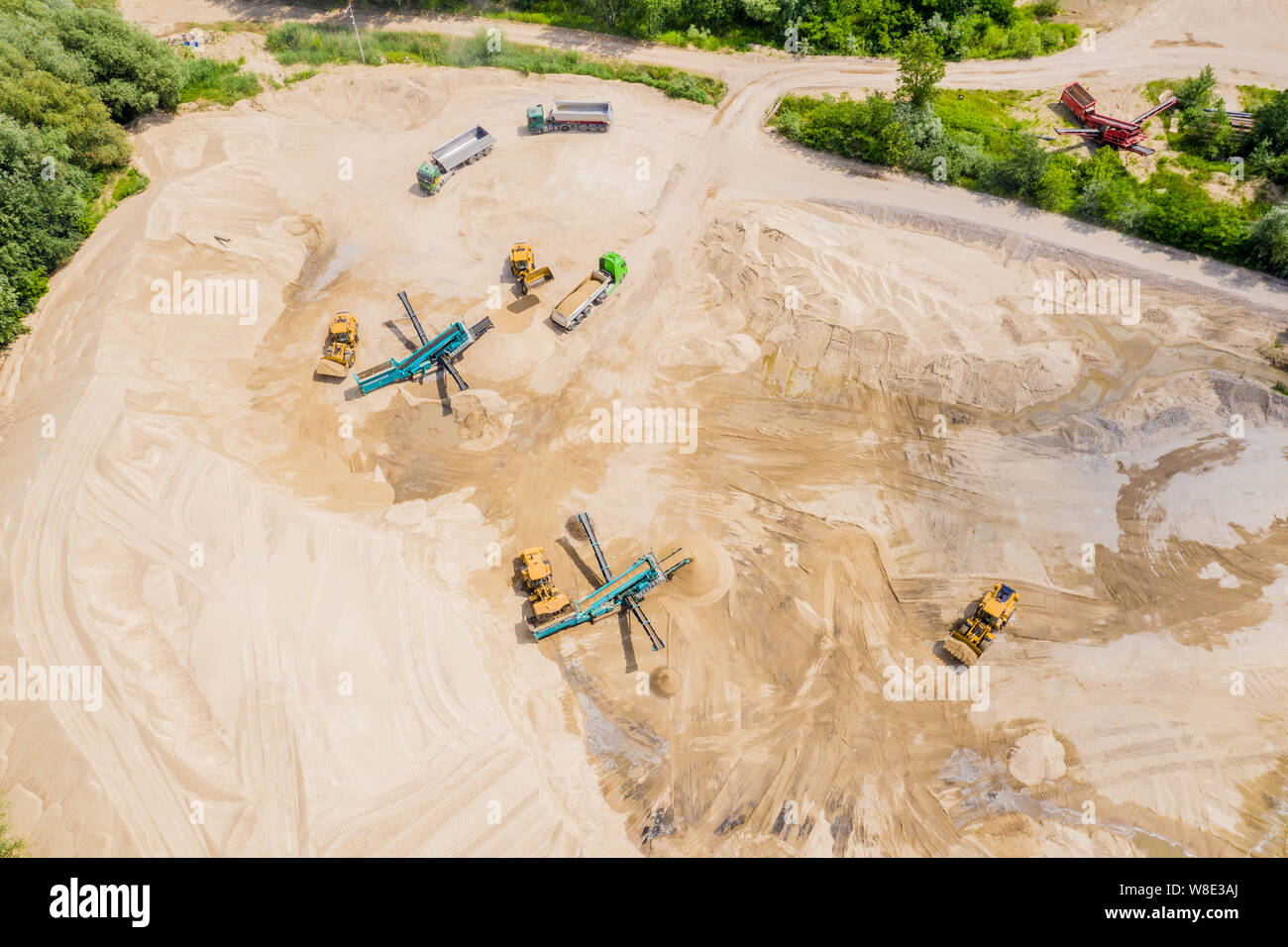 Aerial view of sandpit and factory plant producing sand materials for ...