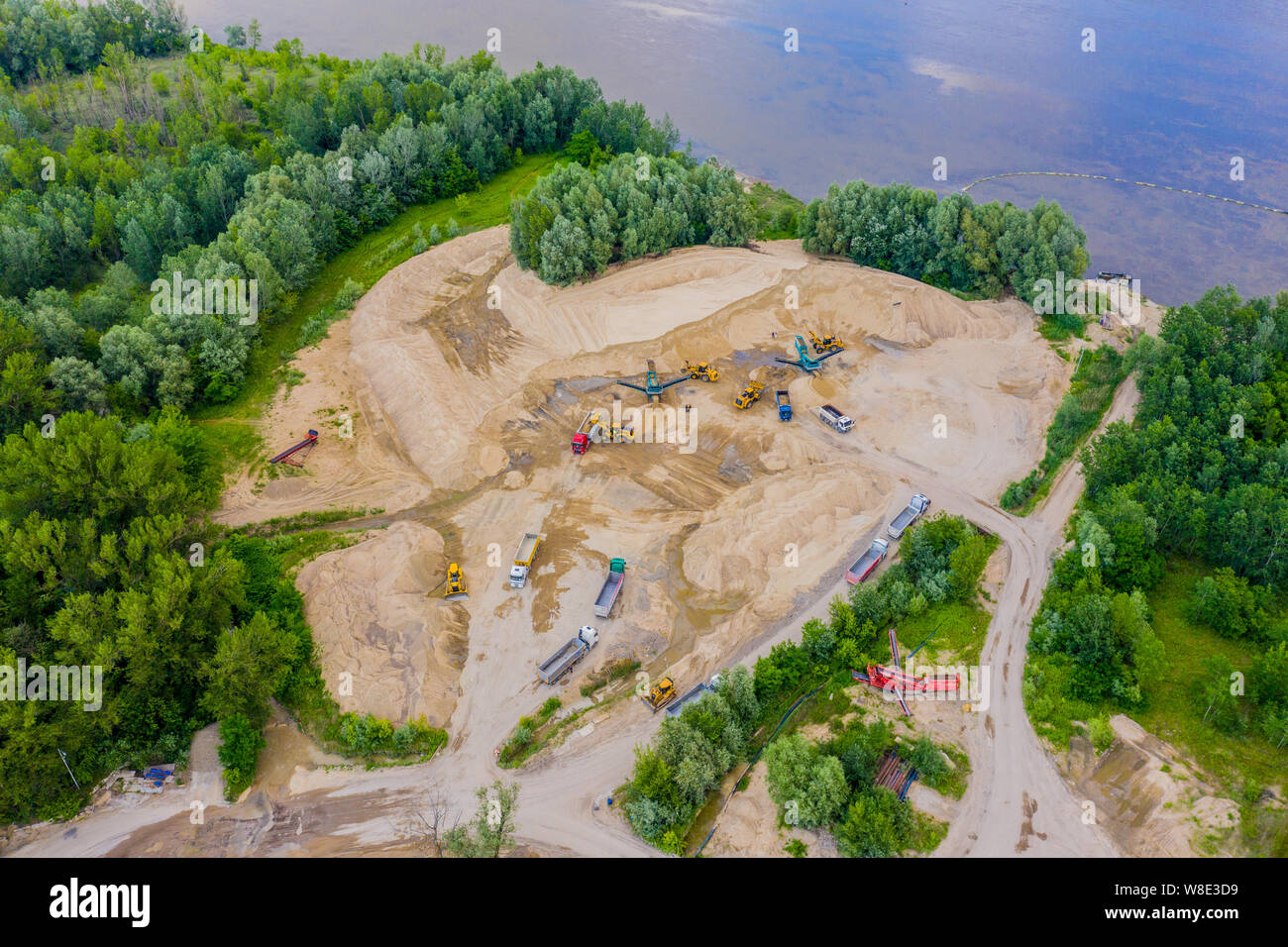 Aerial view over the building materials processing factory. Sand mine ...