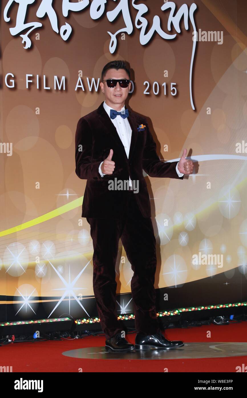 Chinese actor Sun Honglei arrives on the red carpet for the 52nd ...