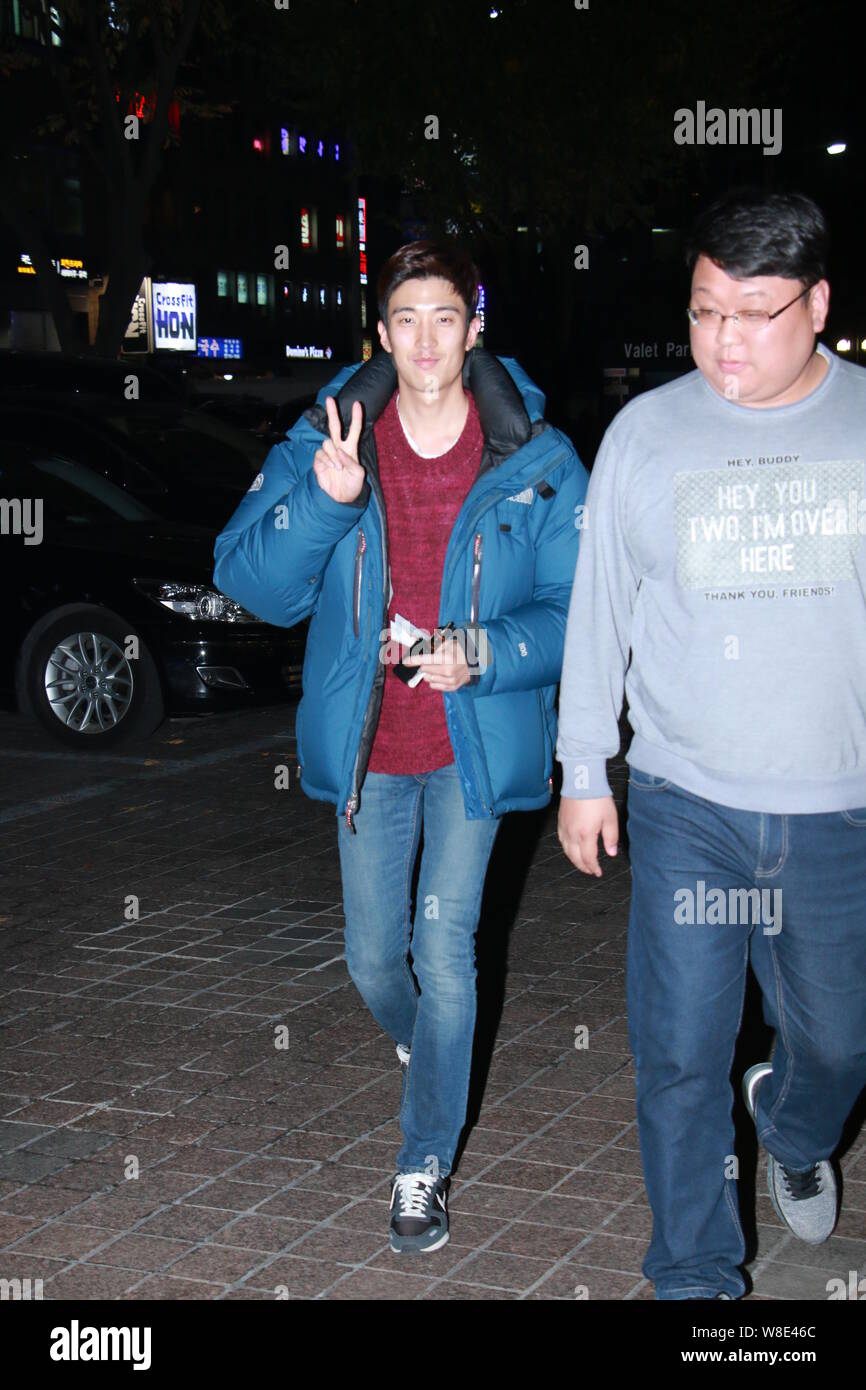South Korean actor Kang Kyung-joon, left, arrives at a barbecue ...
