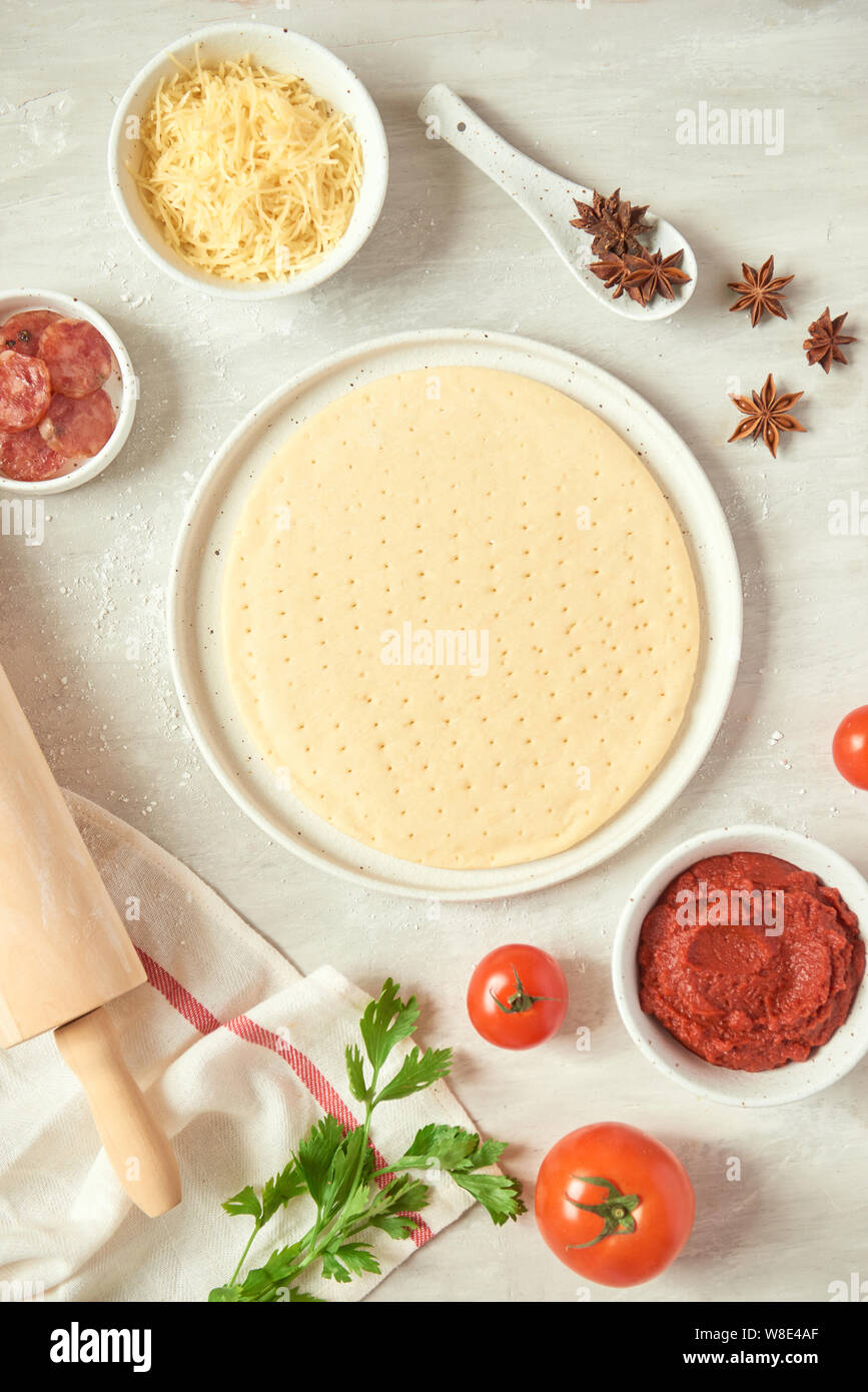Preparing individual pizzas from pizza bar Stock Photo - Alamy