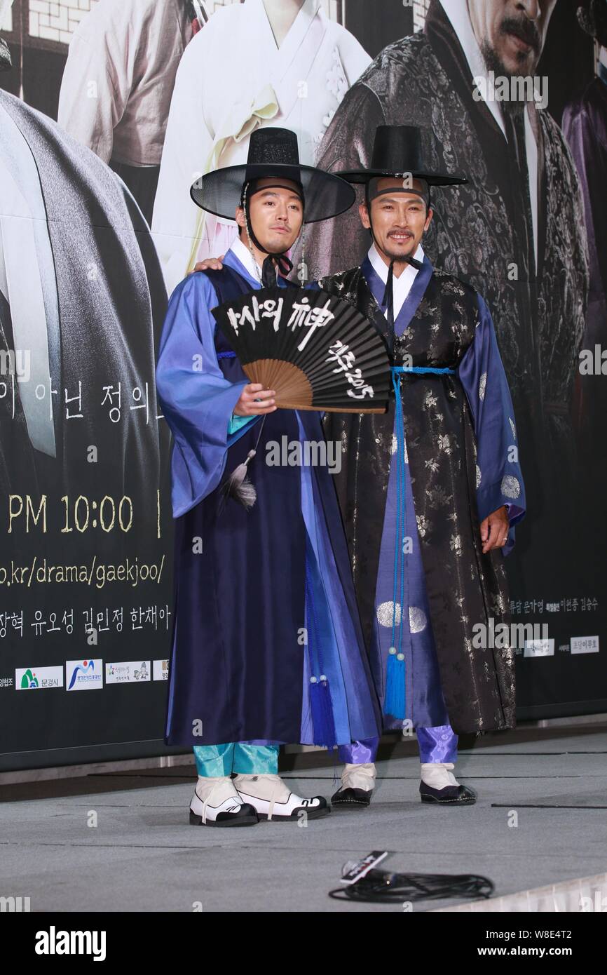 South Korean actors Jang Hyuk, left, and Yu Oh-seong attend a press ...