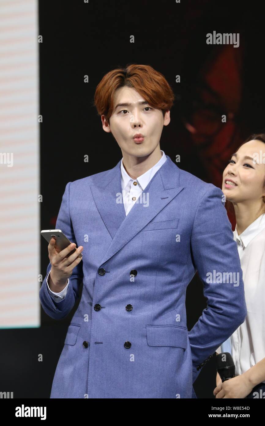 South Korean actor Lee Jong-suk makes faces during a promotional event ...