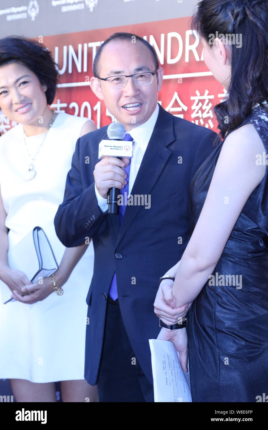 Pan Shiyi, center, co-founder, Chairman and co-CEO of Soho China, is ...