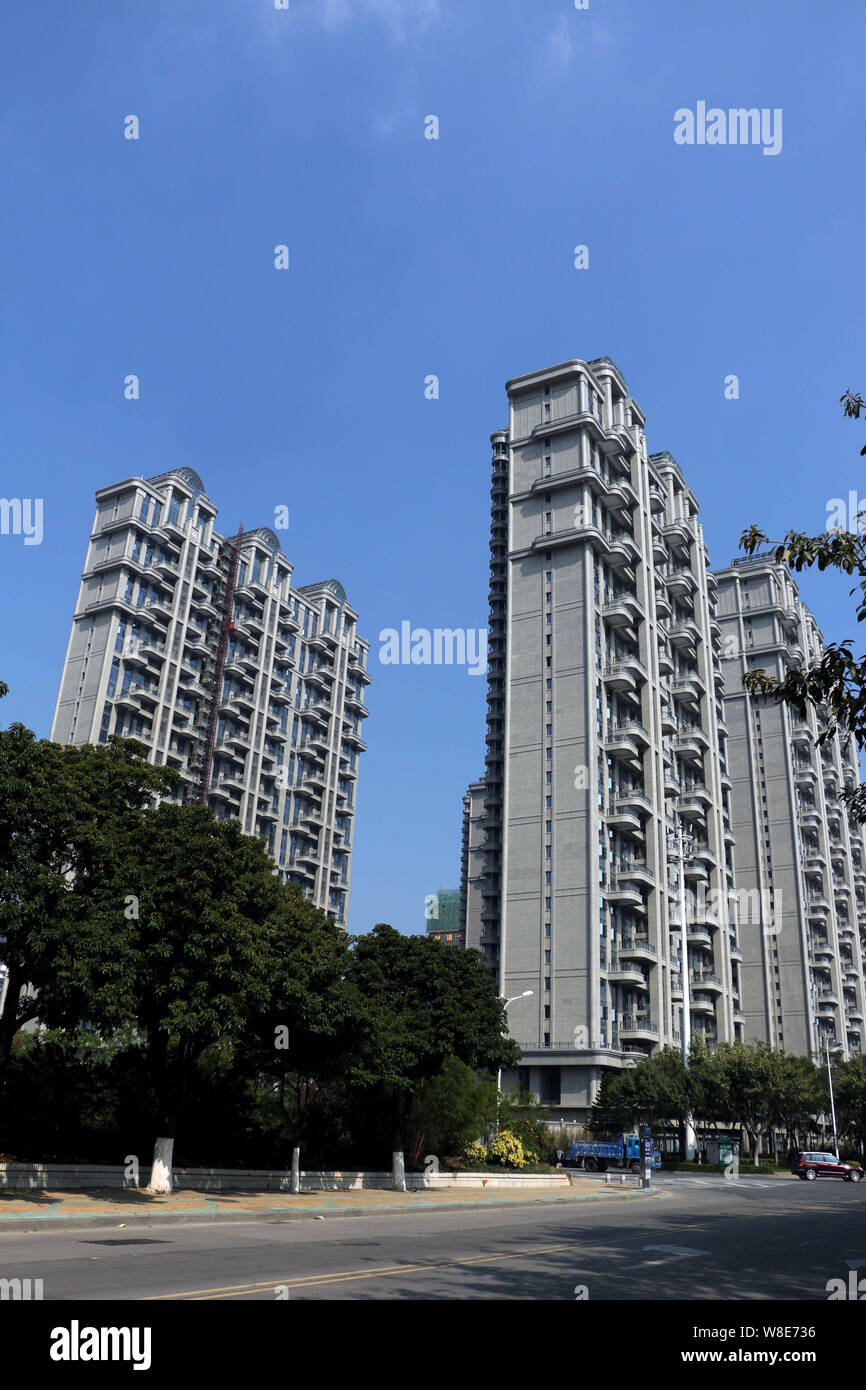 --FILE--Newly-built high-rise residential apartment buildings are ...