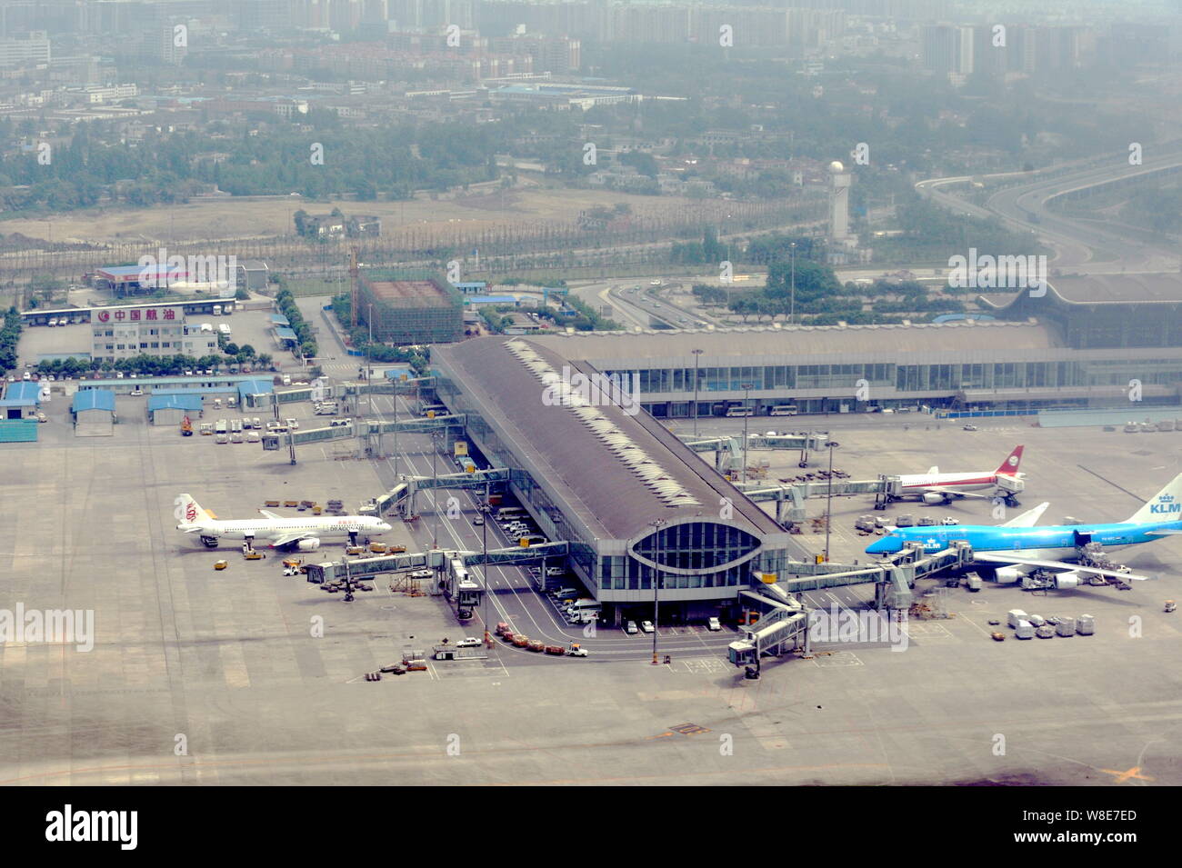 --FILE--Passenger jets are seen on the parking apron at the Chengdu ...