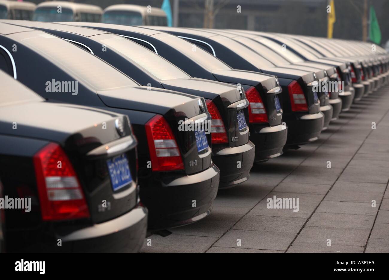 --FILE--Government cars to be auctioned are seen in a parking lot in ...