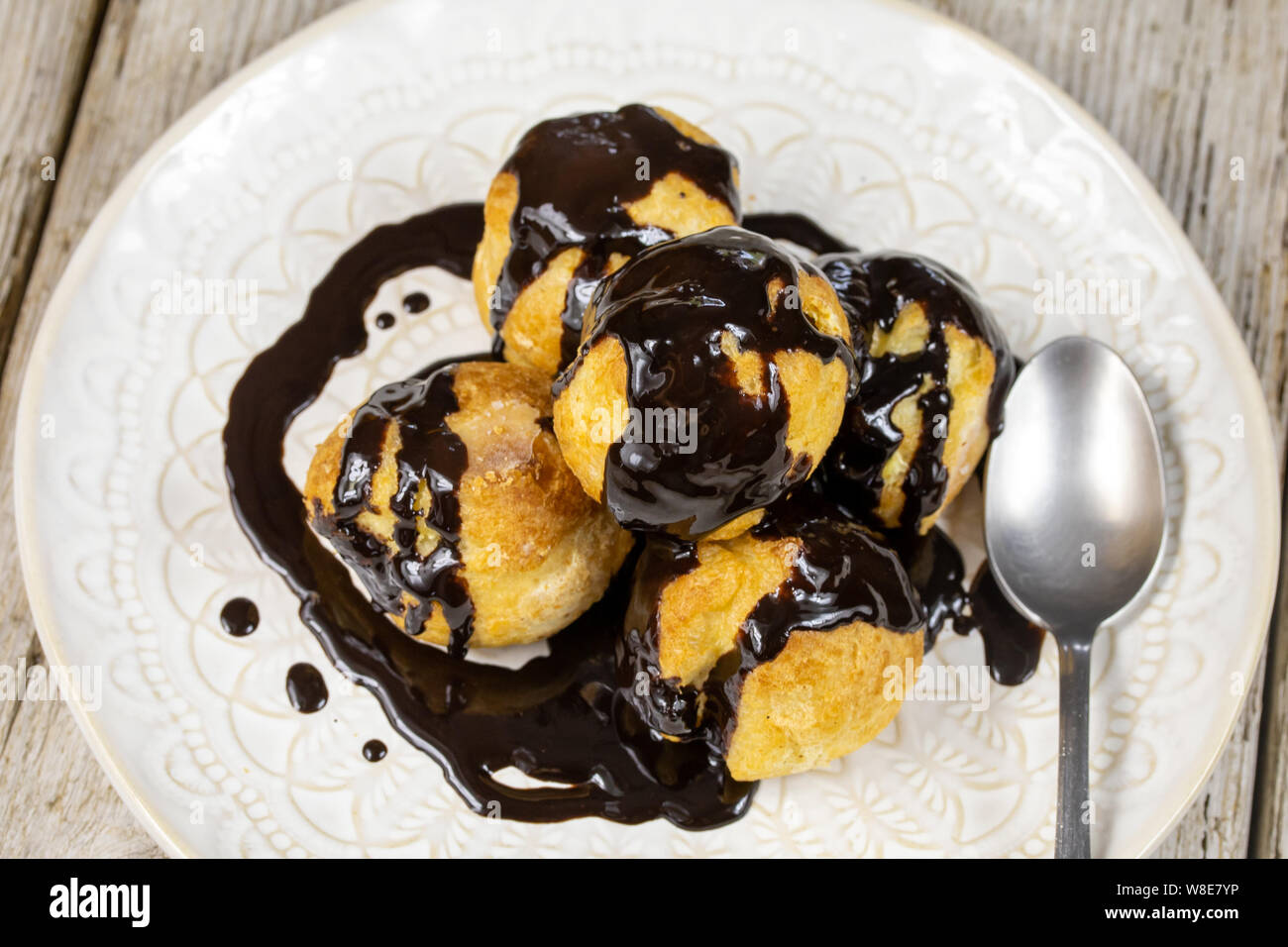 Profiterole with chocolate ganache hi-res stock photography and images ...