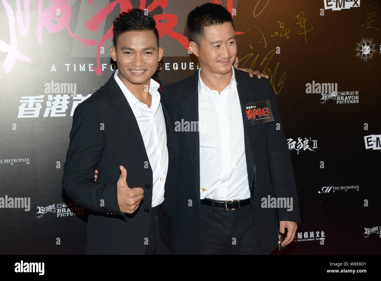 Chinese actor Wu Jing, right, and Thai actor Tony Jaa pose during a ...