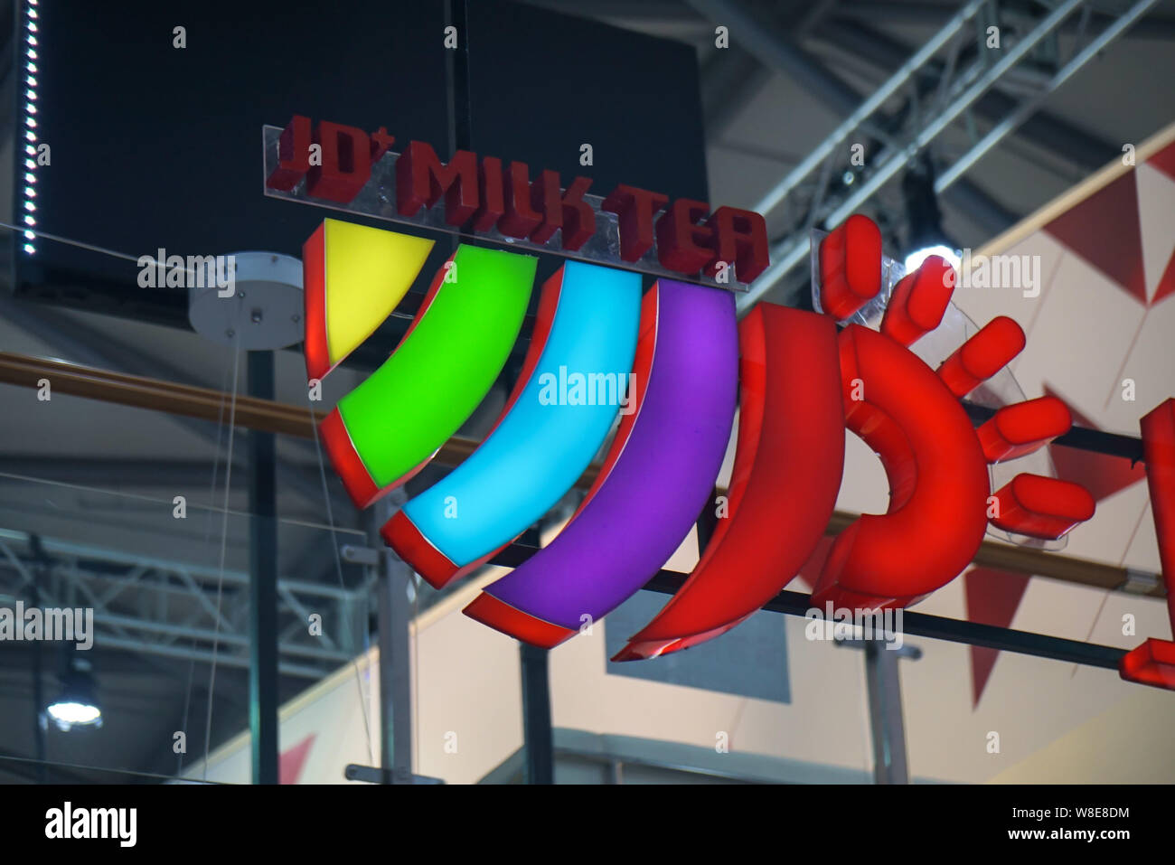 View of a signboard of "JD+ milk tea" at the stand of JD.com, also ...