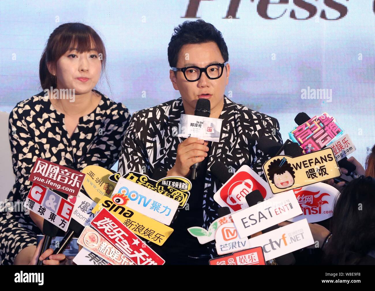 South Korean singer Jeong Soon-won, right, better known by his stage ...