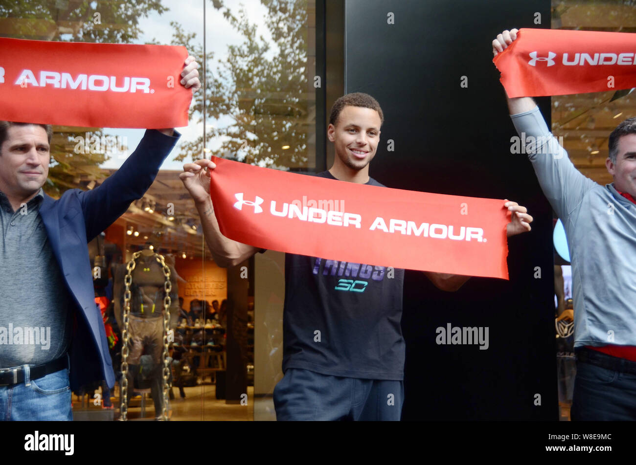 NBA star Stephen Curry, center, attends the opening ceremony for the ...