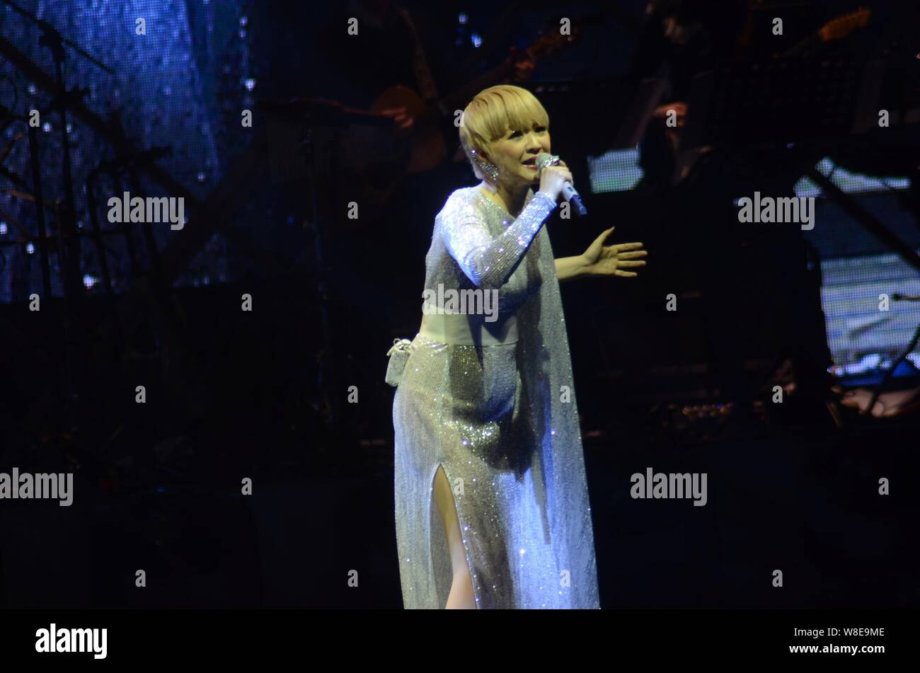 Hong Kong singer Priscilla Chan performs during the concert to mark the ...