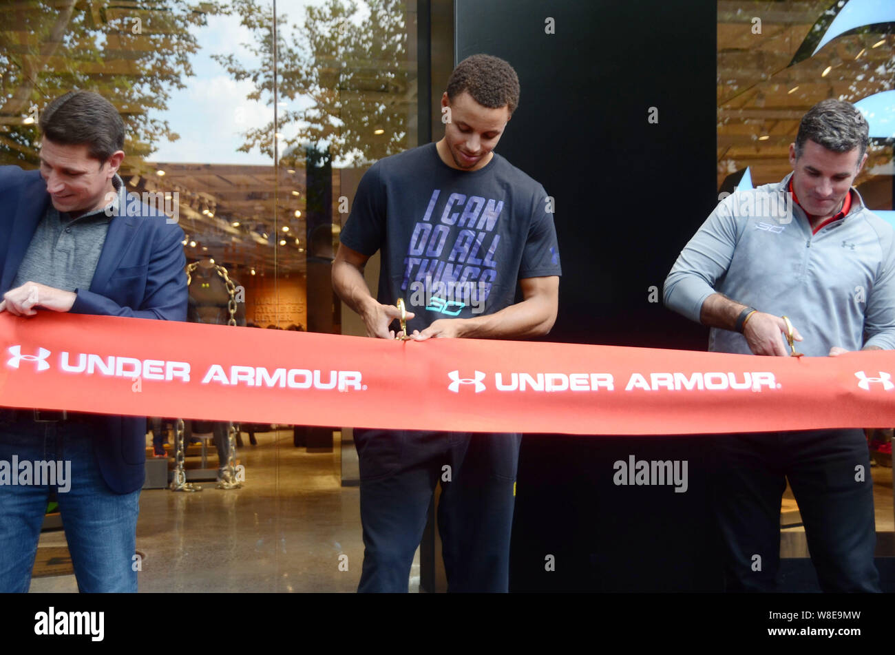NBA star Stephen Curry, center, attends the opening ceremony for the ...