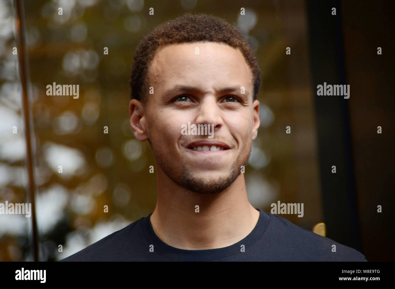 NBA star Stephen Curry attends the opening ceremony for the flagship ...