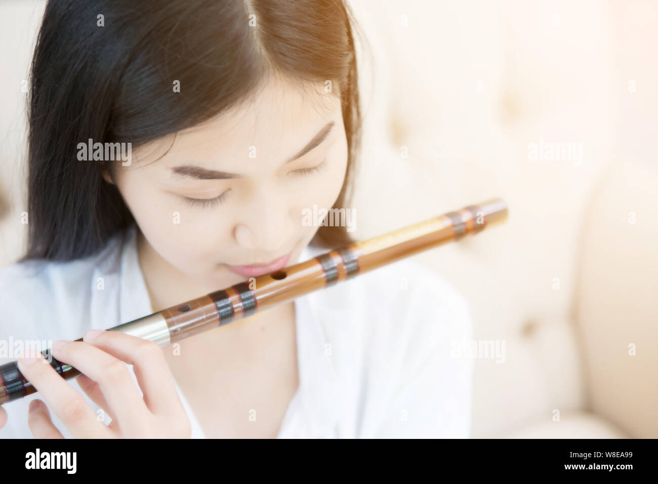 Chinese girl playing instrument hi-res stock photography and images - Alamy
