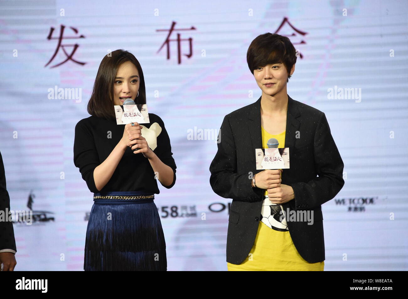 Chinese actress Yang Mi, left, speaks next to singer and actor Lu Han ...