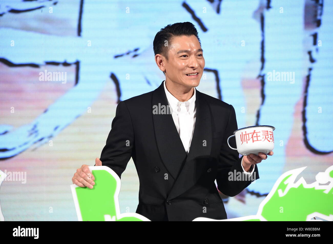 Hong Kong actor and singer Andy Lau poses during a press conference for ...