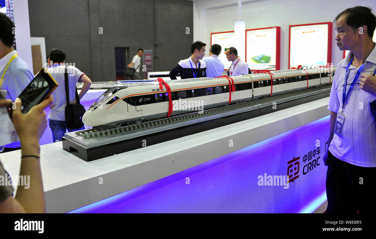 --FILE--Visitors look at models of a CRH (China Railway High-speed ...