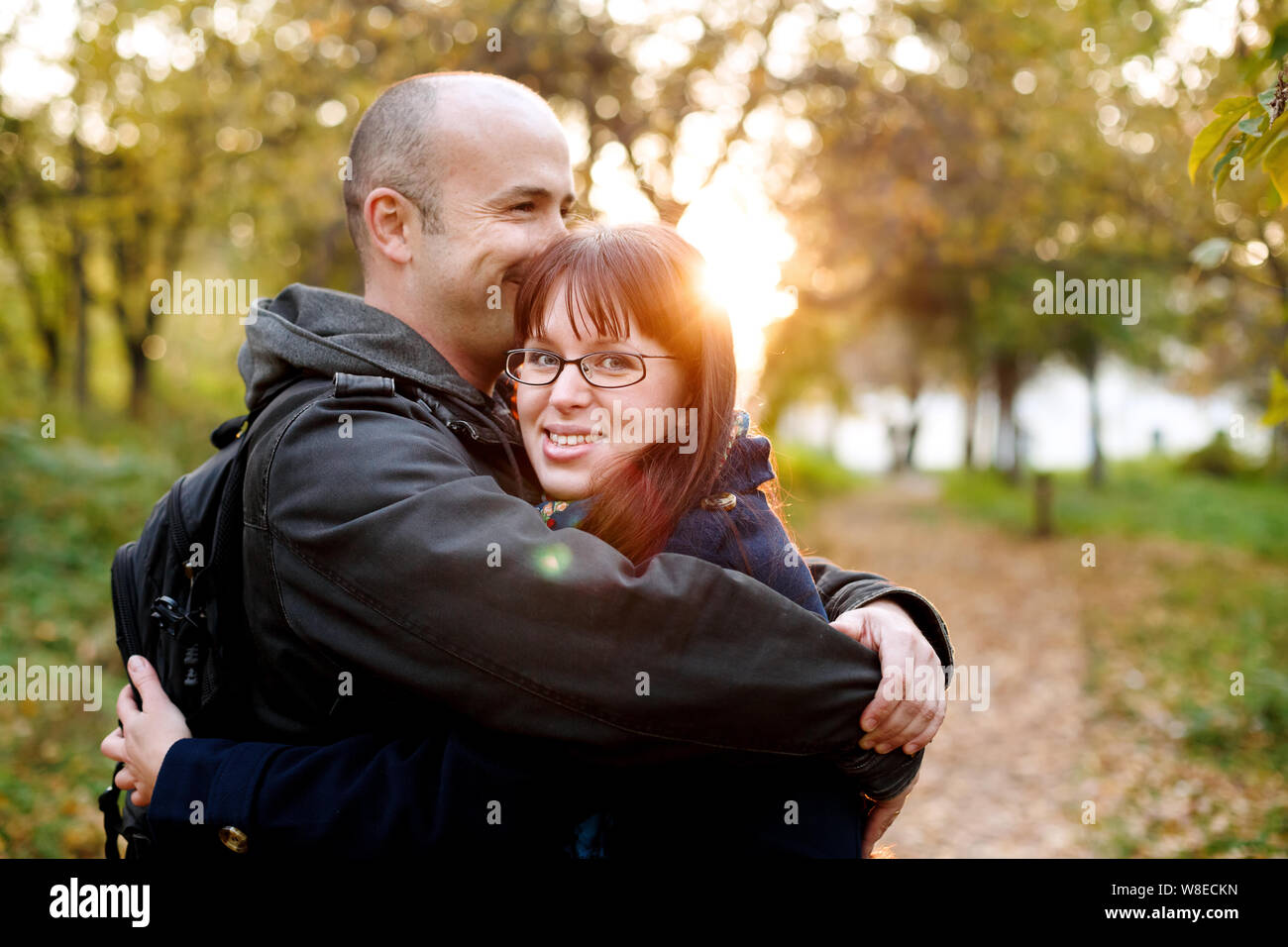 Family embracing warm hi-res stock photography and images - Alamy