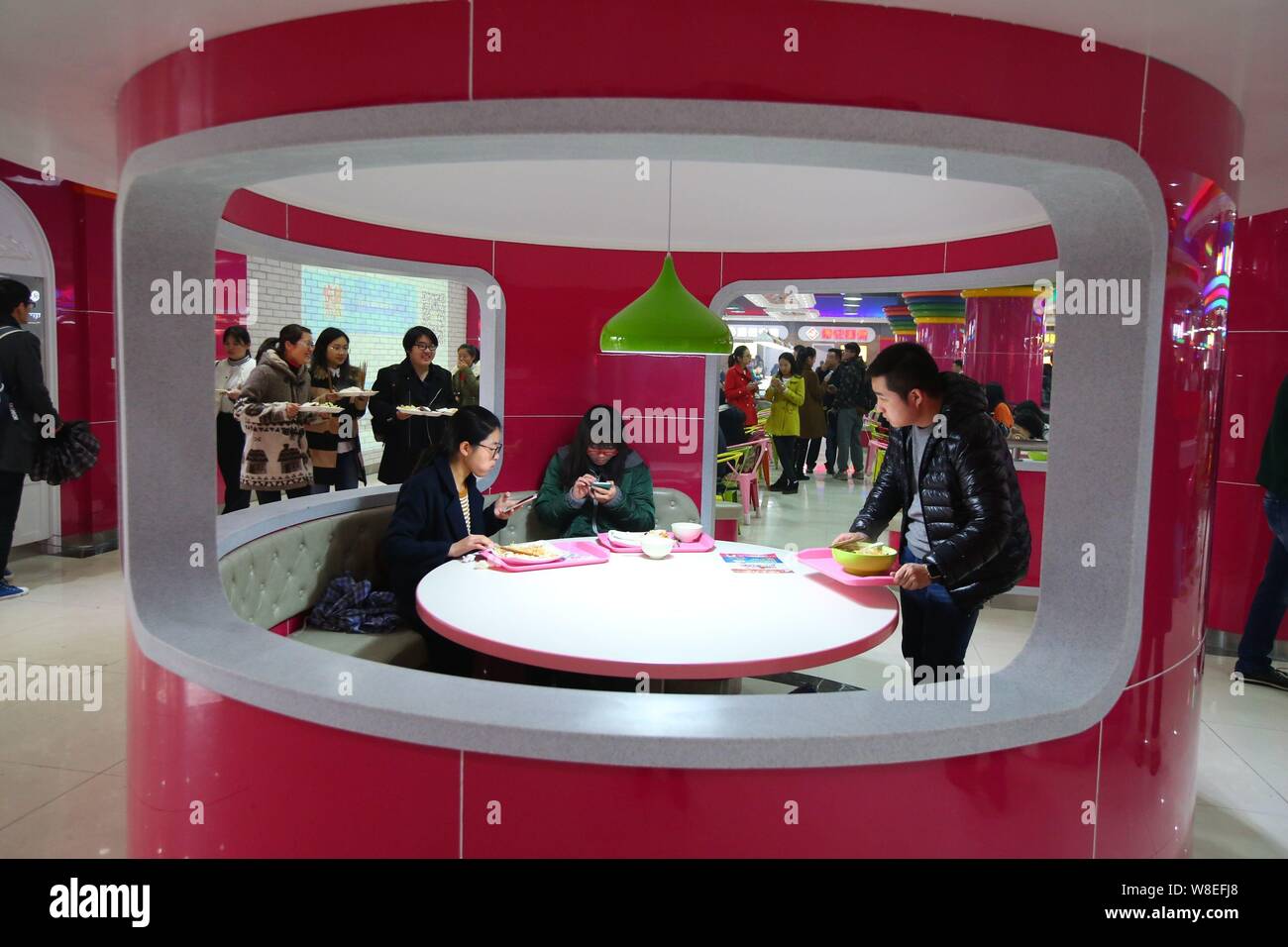 Chinese students eat lunch in the Hello Kitty-themed canteen at ...