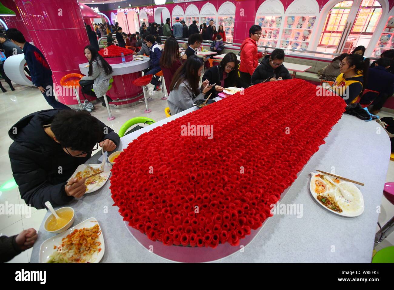 Chinese students eat lunch in the Hello Kitty-themed canteen at ...