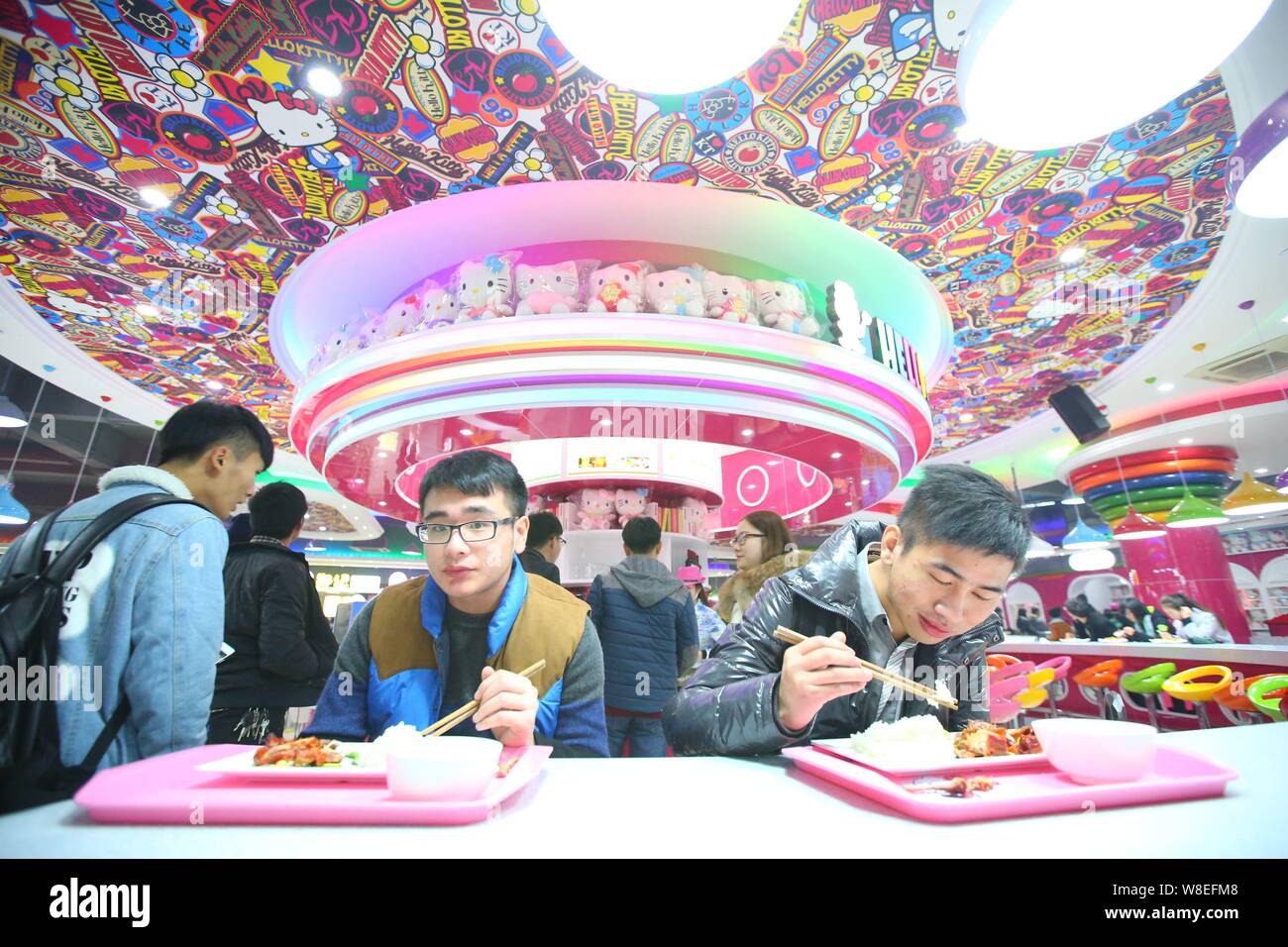 Chinese students eat lunch in the Hello Kitty-themed canteen at ...