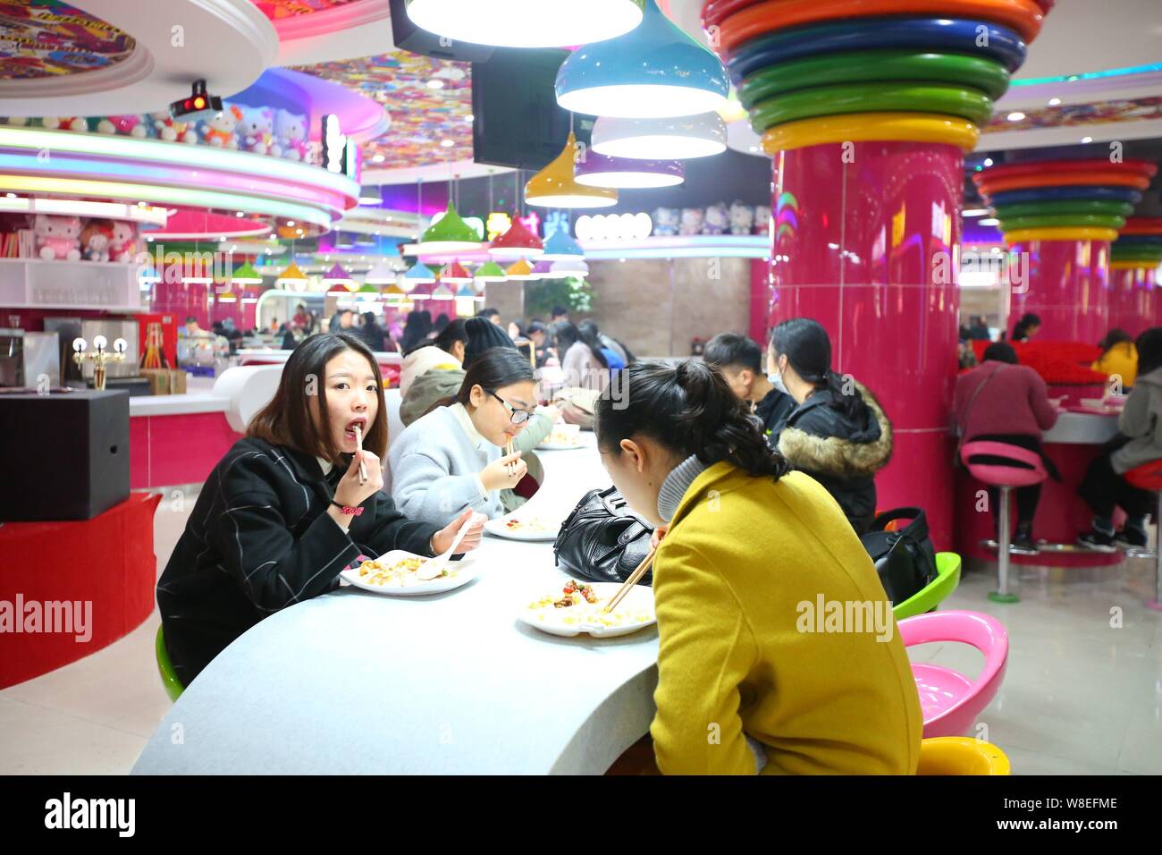 Chinese students eat lunch in the Hello Kitty-themed canteen at ...