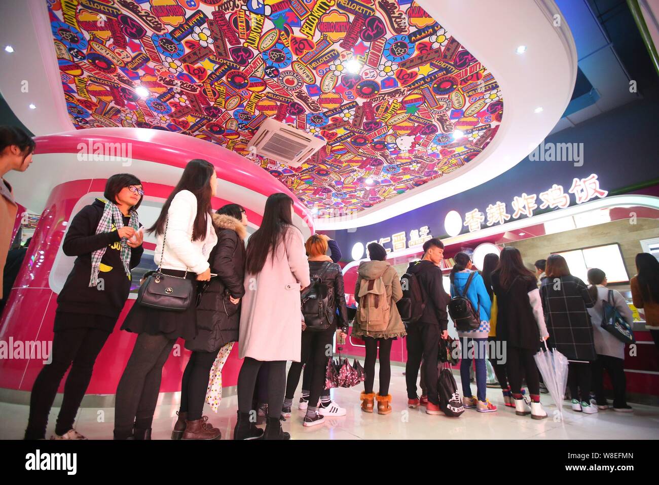 Chinese students queue up to order food in the Hello Kitty-themed ...