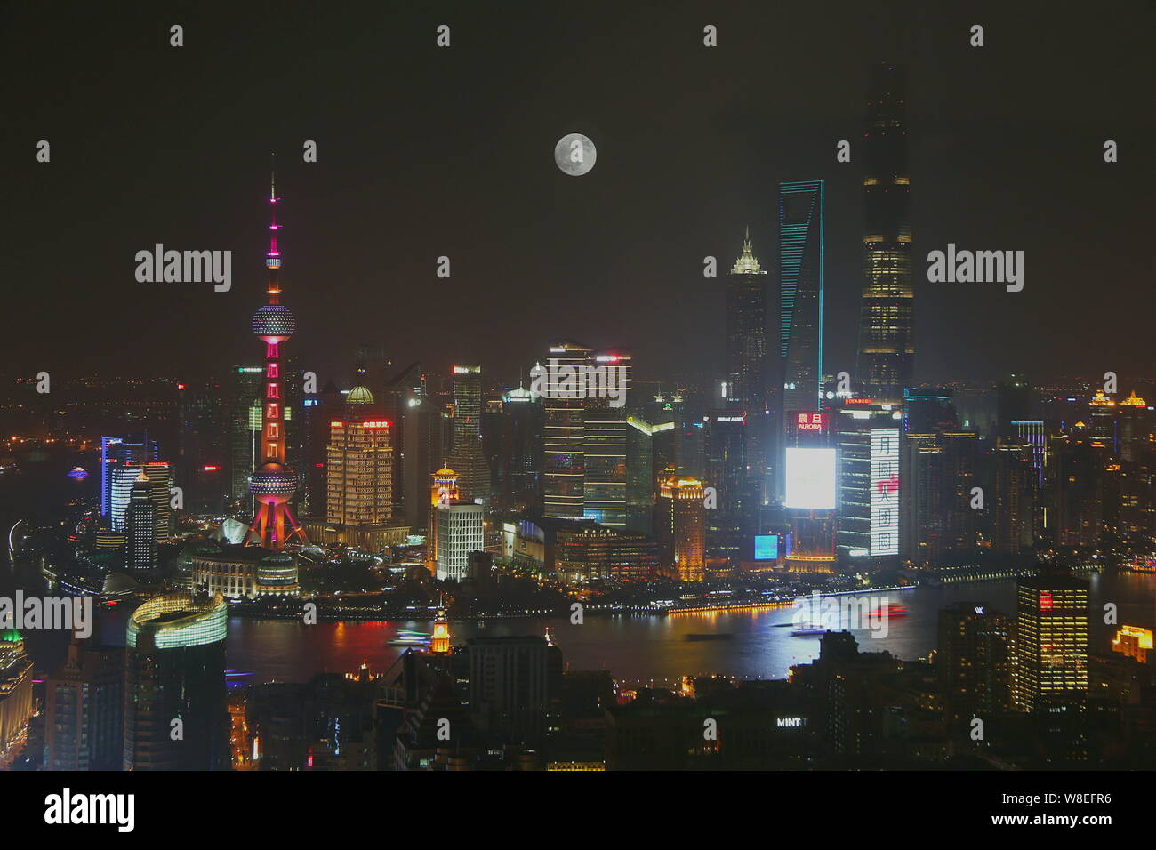 View of the full moon over the Oriental Pearl TV Tower, left tallest ...