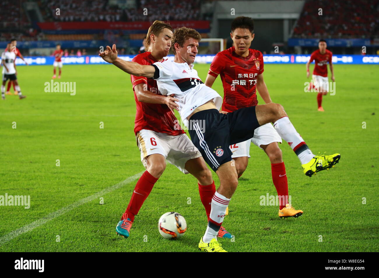 Feng Xiaoting, left, and Wang Shangyuan, right, of Guangzhou Evergrande ...