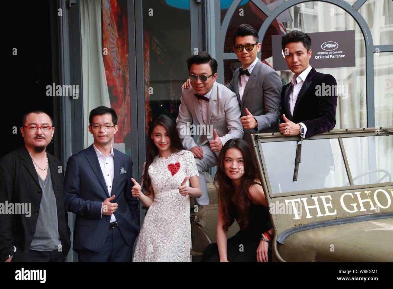 Cast members pose at a photocall for their movie "The Ghouls" during ...