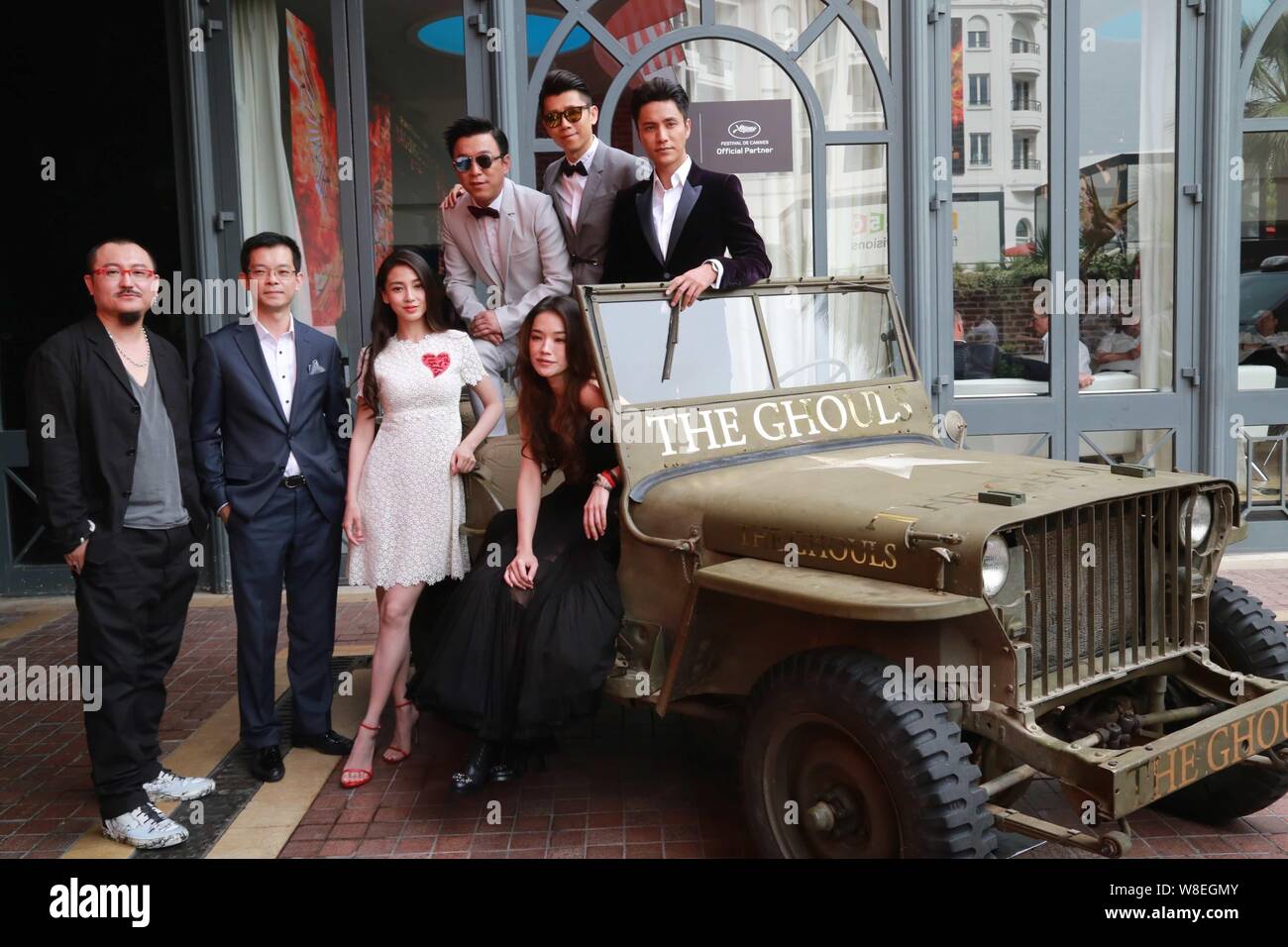 Cast members pose at a photocall for their movie "The Ghouls" during ...