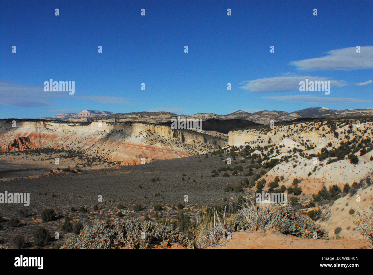 A beautiful panoramic landscape of colorful volcanic sandstone cliffs ...