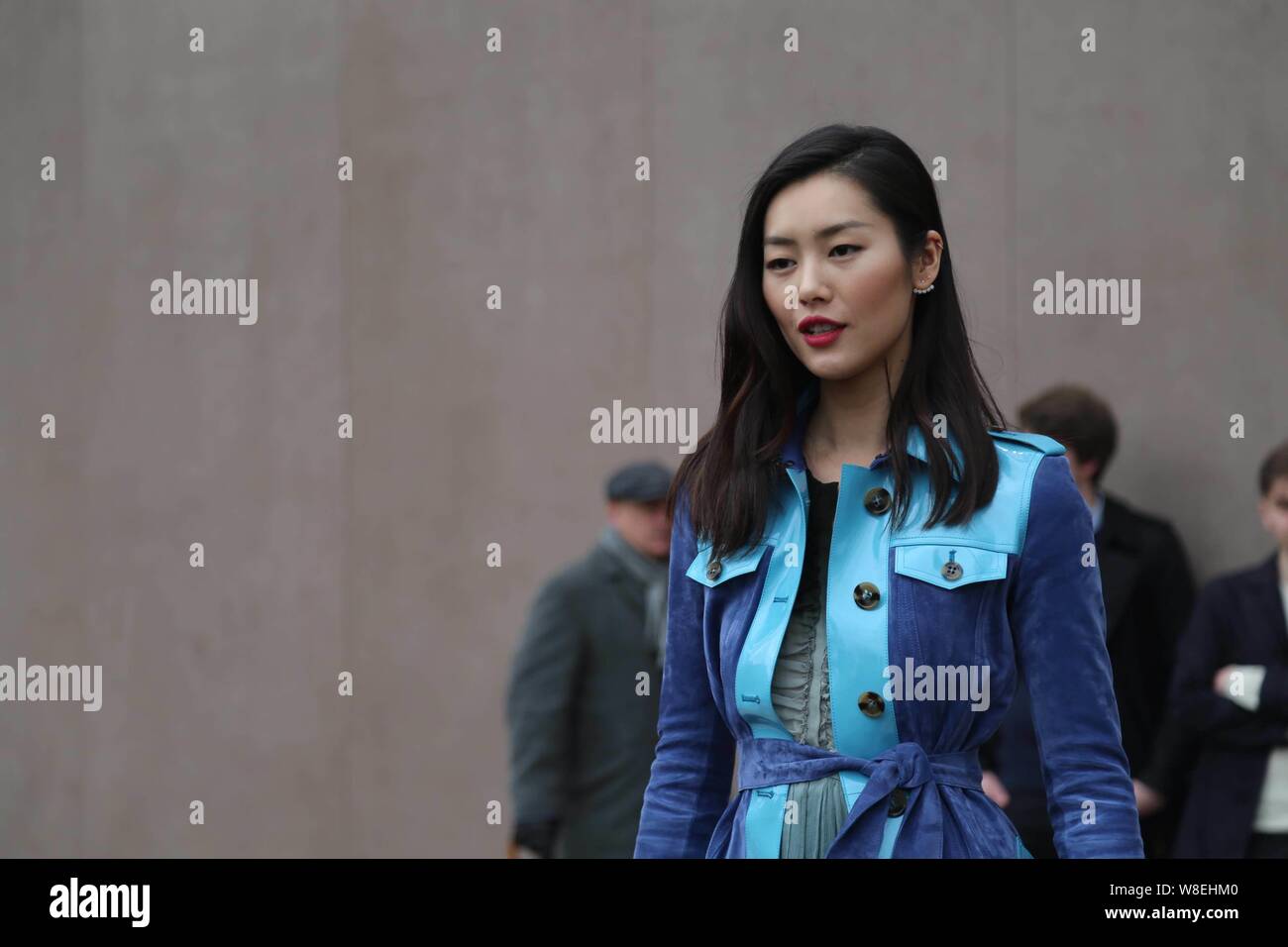 Chinese model Liu Wen poses for photos as she arrives at the Burberry ...
