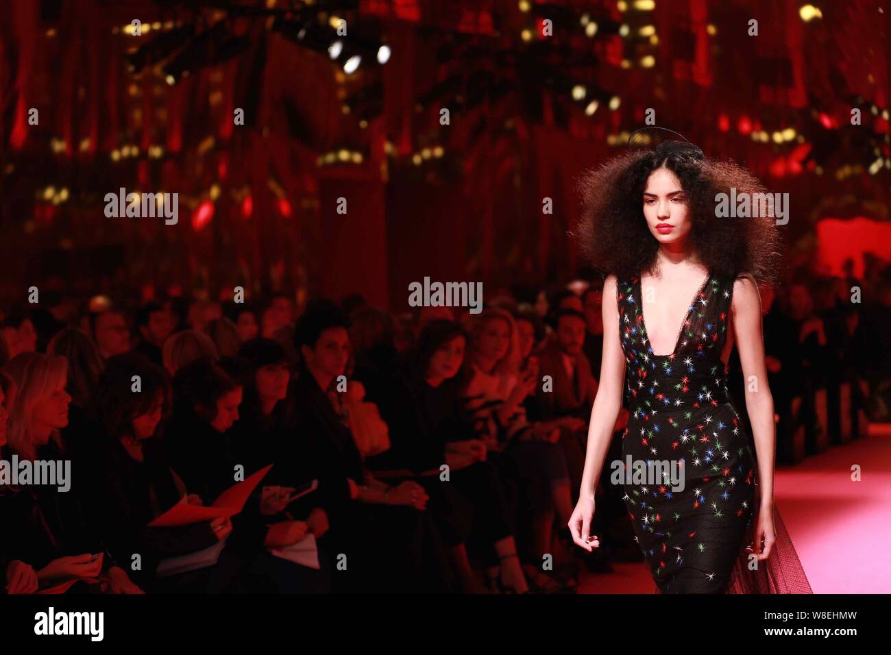 A model displays a new creation at the Schiaparelli fashion show during ...