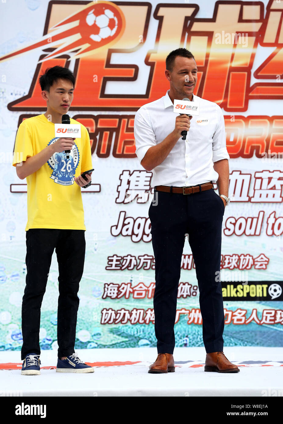 English soccer player John Terry, right, speaks during a promotional ...