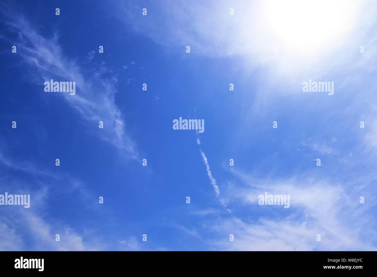 Beautiful sunlight beams through clouds on a sunset summer sky Stock ...