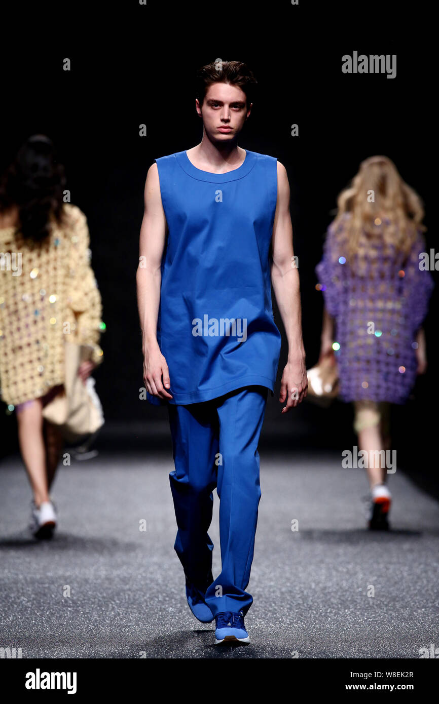 A model displays a new creation at the Nicole Zhang fashion show during ...