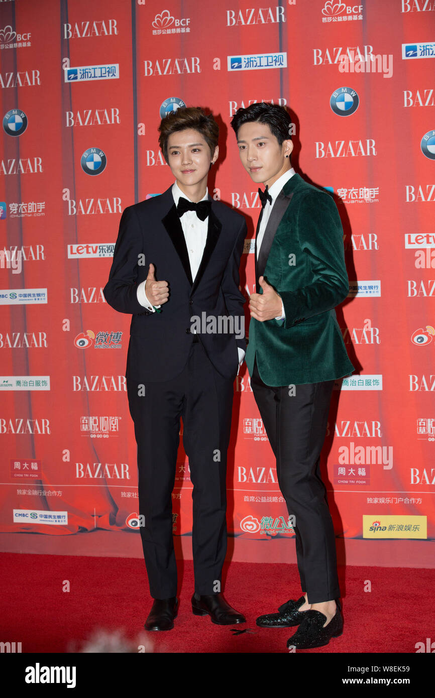 Chinese singers and actors Lu Han, left, and Jing Boran arrive on the red carpet for the 2015 ...