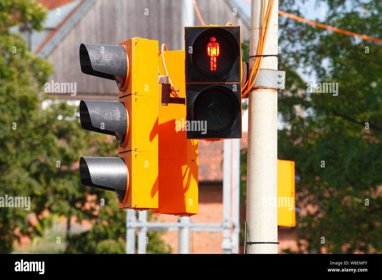 Construction site traffic light switched to red, traffic sign ...