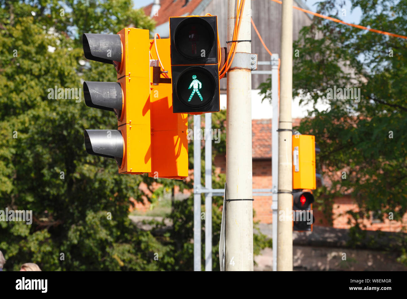 Construction site traffic light switched to green, traffic sign ...