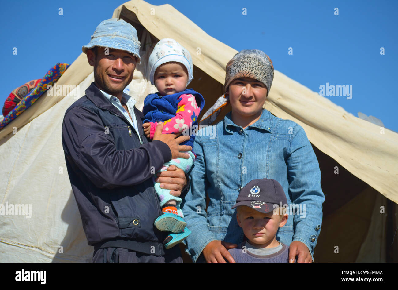Nomadic shepherd family in their yurt at the Hissar mountains ...